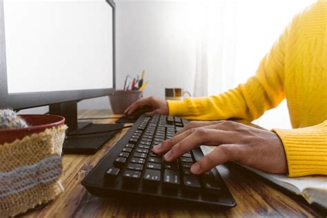 Premium Photo Hands Of An Unrecognizable Person Typing On A Computer