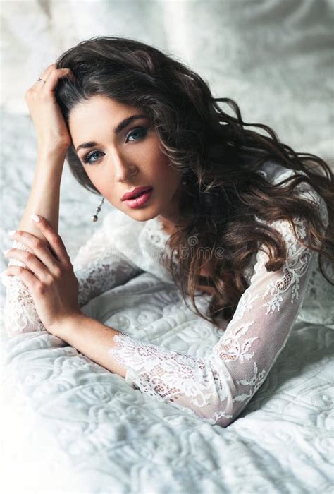 Woman Posing On Bed In White Lingerie Stock Photo Image Of Sensual