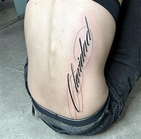 cursive font tattoos