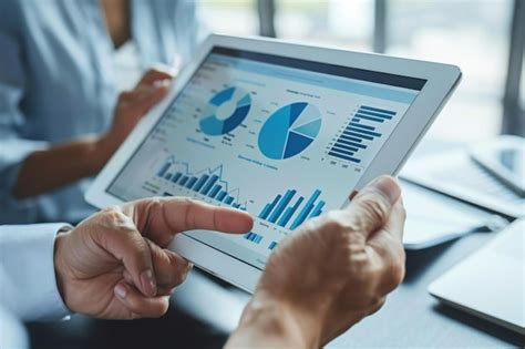 Premium Photo Person Analyzing Data On Tablet