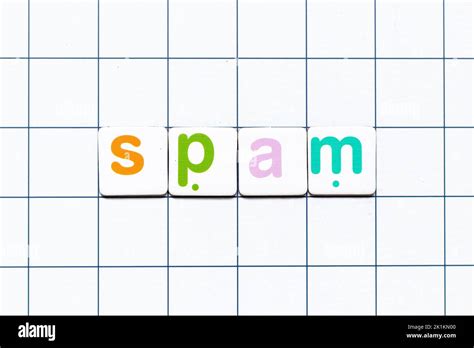 Colorful Tile Letter In Word Spam On White Grid Background Stock Photo Alamy
