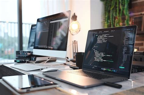 Premium Photo Startup Programming Team Designing Website On Digital Devices