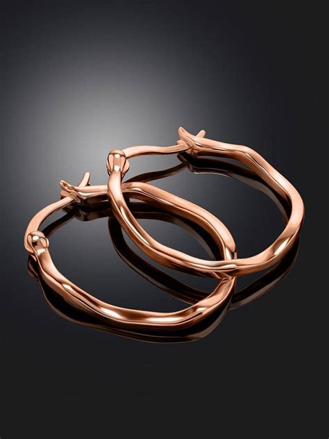 Серьги Серьги из серебра в позолоте Стильные серьги кольца Liquid