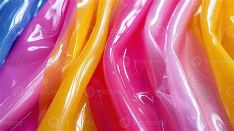 Colorful Glossy Waves Of Plastic Material Create A Vibrant Abstract
