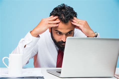 Premium Photo Frustrated Indian Asian Young Businessman With Beard