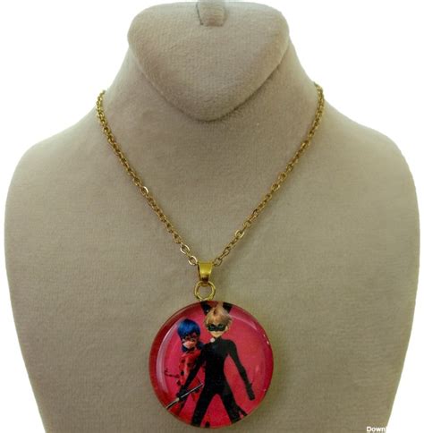 عکس گوشواره دختر کفشدوزکی و انگشتر گربه سیاه