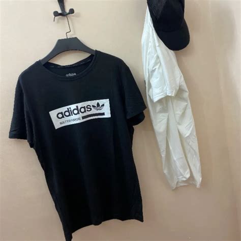 کمدا قیمت و خرید آدیداس رنگ سفیدمشکی سایز مدیوم و‌لارج