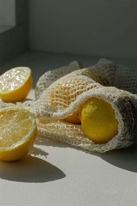 감귤류 건강한 건강한 식생활 과일 과즙이 많은 노란색 농작물 다이어트 레몬 레몬 주스 메쉬 백 밝은 베이킹 비건 채식 비타민 C 상쾌한 생생한