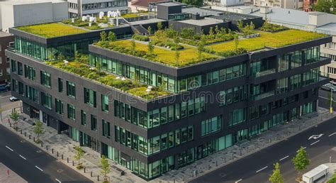 Modern Rectangular Building With Multiple Floors Featuring Extensive Green Roofs Stock