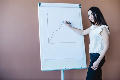 Free Photo Woman Drawing A Graph