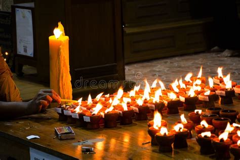 Thai Young Monk Light A Fire Candle For Respect Praying Buddha God Deity Angel With Holy