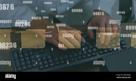 Image Of Numbers Changing Over Woman Typing On Computer Keyboard And Cardboard Boxes Stock Photo
