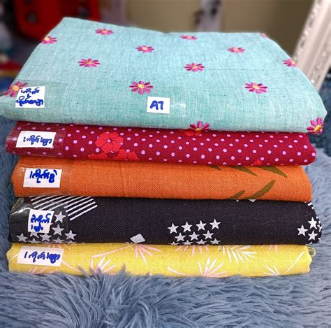 ခိုင် ခိုင်ပန်းချီ ပိုးထည်နှင့် ရိုးရာချည်ထည် ဖြန့်ချီရေး