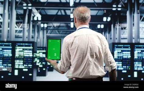 Tech Savvy Specialist Expertly Managing Data While Navigating Through Industrial Supercomputers