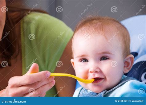 Mother Feeding Hungry Baby Stock Image Image Of Dinner