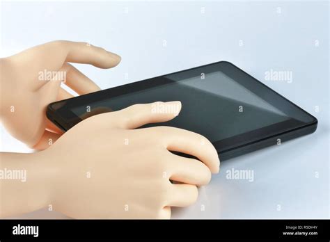 Hands Holding A Modern Wireless PDA Device Stock Photo Alamy