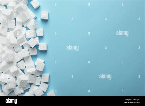 Many Styrofoam Cubes On Light Blue Background Flat Lay Space For Text