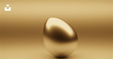 금 배경에 빛나는 황금 달걀 사진 Unsplash의 무료 구체 이미지