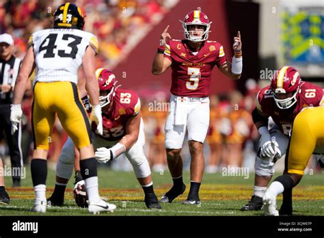Iowa State Quarterback Rocco Becht 3 Signals Teammates During The