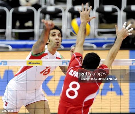 Irans Mohammad Mohammad Kazem Spikes The Ball Against Egypts Saleh