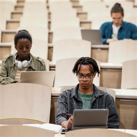 Free Photo Young Students Attending A Class Free Photo Young Students Attending A Class