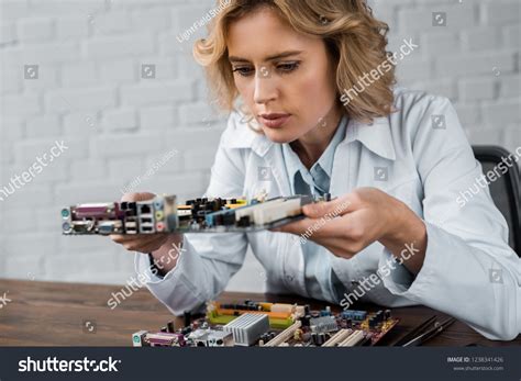 Concentrated Female Computer Engineer Holding Motherboard Stock Photo 1238341426 Shutterstock