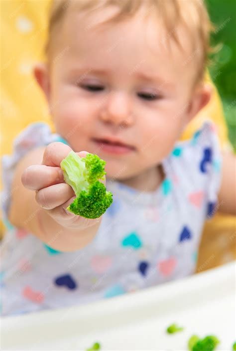 Premium Photo Close Up Of Cute Girl Eating Food