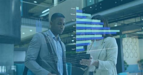 In Office Business Professionals Analyzing Data With Bar Graph