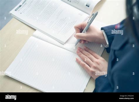 Female Babe Writing In A Notebook Stock Photo Alamy