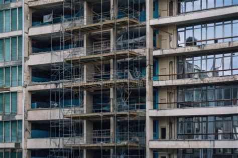 Outdated Scaffolding With Broken And Missing Parts Near Modern Building Stock Image Image Of