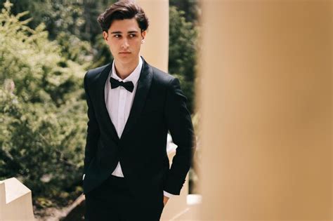 Premium Photo A Beautiful Young Man The Groom In An Elegant Wedding