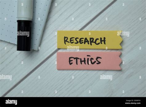 Research Ethics Text On Sticky Notes Isolated On Office Desk Stock