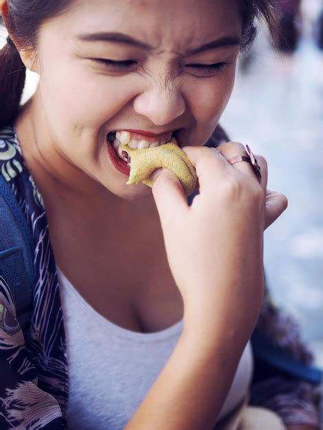 Premium Photo Close Up Of Woman Eating Food