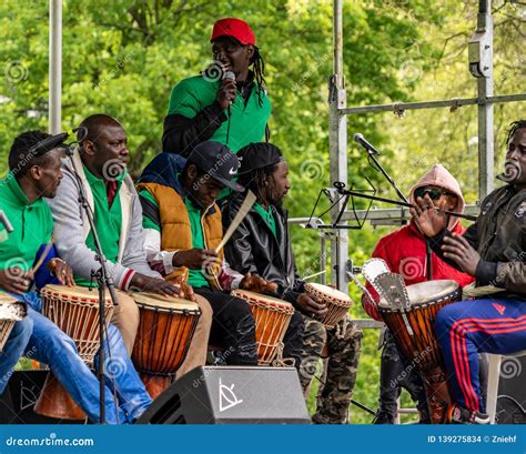 Group Of Black Musicians At A Concert With Drums At A Festival For The