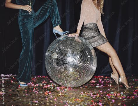 Women Posing With Disco Ball Stock Photo Adobe Stock