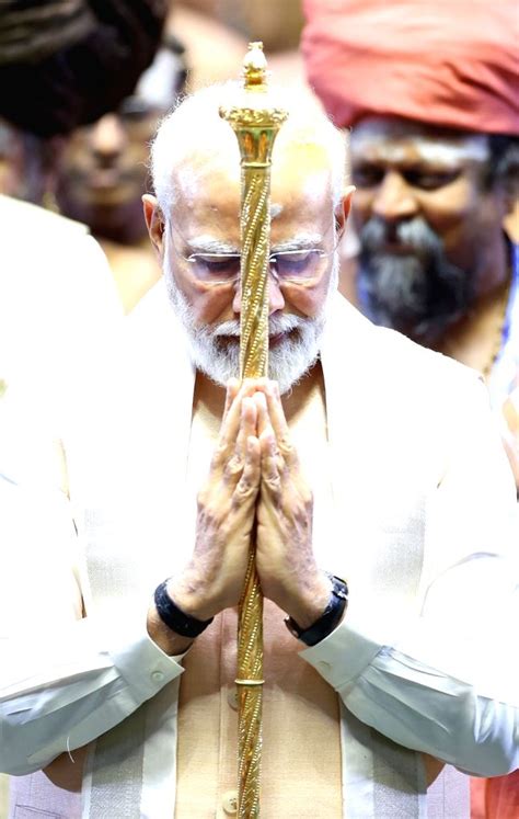 New Delhi Prime Minister Narendra Modi Carries The Sengol In A