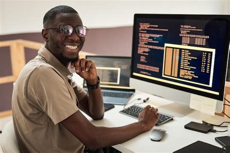 premium photo portrait of joyful software developer in glasses