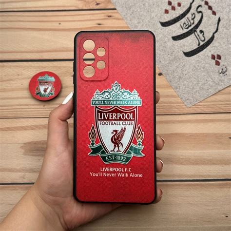 قاب گوشی Galaxy A72 سامسونگ فانتزی سوزنی برجسته طرح Liverpool پاپ سوکت دار کد 78115 قاب سنتر