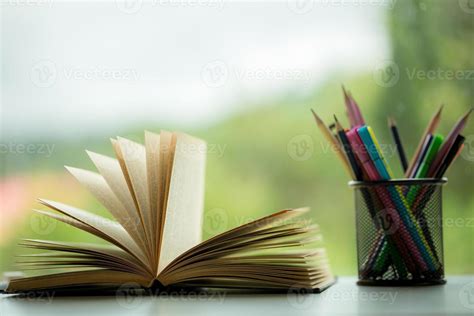 Object Education Green Nature Background With Stack Of Ancient Books Or Old Bible Open Paper