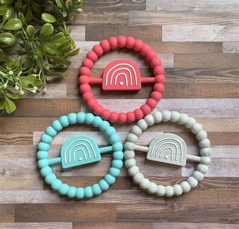 Modern Rainbow Silicone Teething Ring Row Me