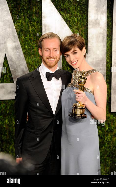Actress Anne Hathaway And Husband Adam Shulman Arrive For The 2013