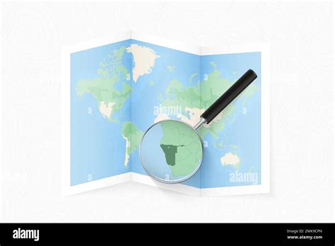 Enlarge Namibia With A Magnifying Glass On A Folded Map Of The World Vector Paper Map Stock