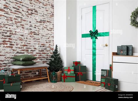 Interior Of Hall With White Door Christmas Presents And Bench Stock