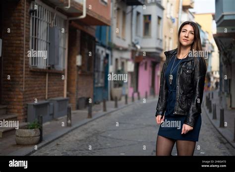 Tall Attractive Woman Walks Along Narrow City Street The Young Woman