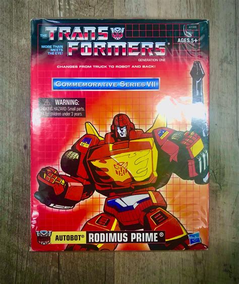 toysrus exclusive commemorative reissue transformers toy from hasbro of rodimus prime with my