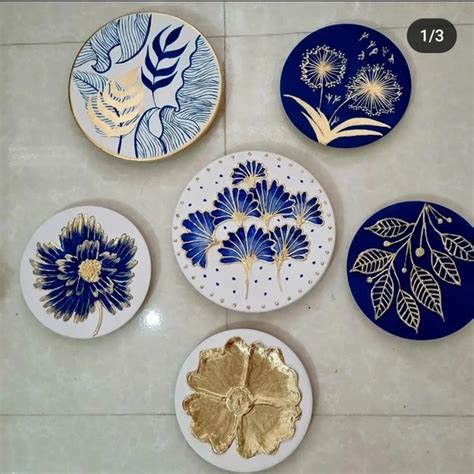 خرید و قیمت ست دیوار کوب بشقاب دیواری سفالی آبی سفید ب جسته ورق طلا ترب