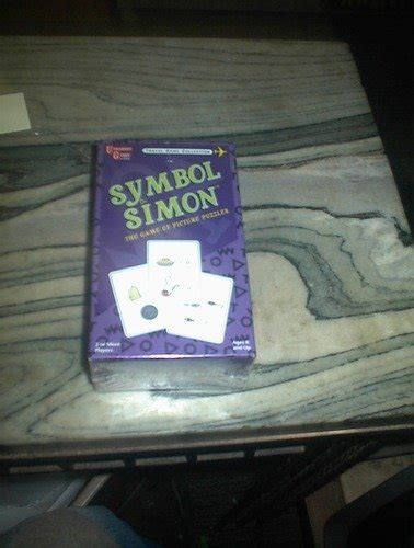 Symbol Simon The Game Of Picture Puzzles 9781575281254 Books