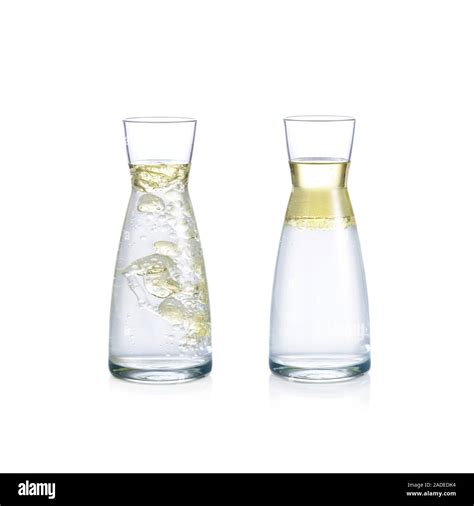 Immiscible Liquids Sequence Showing A Flask Containing Vegetable Oil And Water Demonstrating