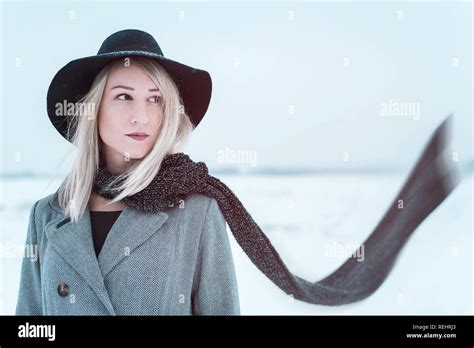 Woman In Scarf With The Wind