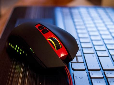 Premium Photo Close Up Of Red And Black Computer Mouse On Laptop